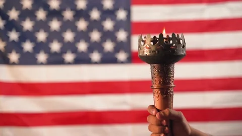 Olympic torch with background USA flag | Stock Video | Pond5