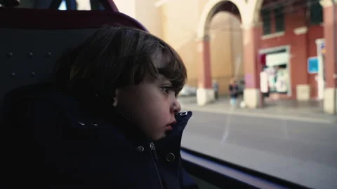 One contemplative little boy inside bus ... | Stock Video | Pond5