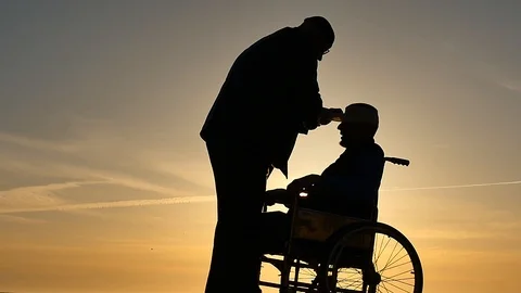 One man bondaging head of disabled peson... | Stock Video | Pond5
