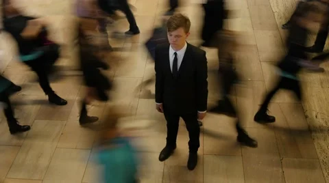 one man standing out of the crowd. young... | Stock Video | Pond5