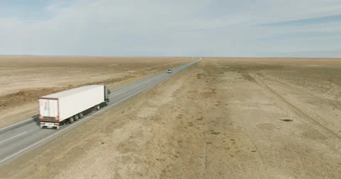 One Semi Truck with white trailer and ca... | Stock Video | Pond5