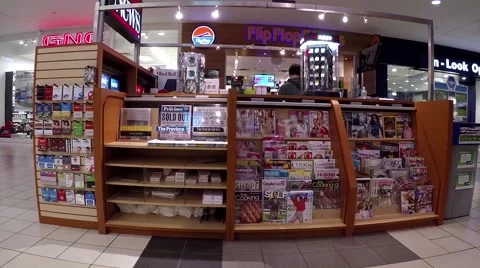 One side of newspaper booth inside shopp... | Stock Video | Pond5