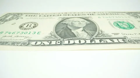 The one USA dollar bill on the white tab... | Stock Video | Pond5