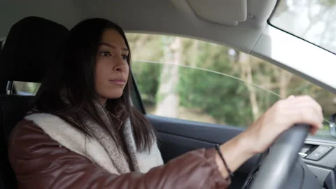 One young woman driving car with hands o... | Stock Video | Pond5