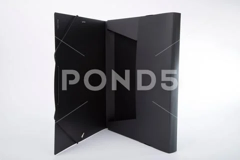 Photograph: Open black empty plastic file cover folder isolated on ...