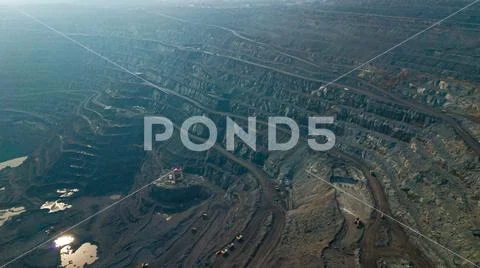 An open-cast mine quarry using an open-pit mining of ore type according ...