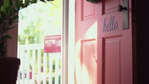 open front door in with welcoming Hello ... | Stock Video | Pond5