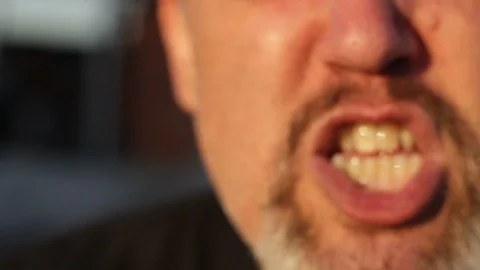 Open mouth of men with gray beard who sc... | Stock Video | Pond5