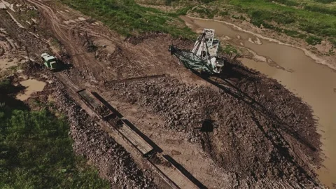 Open-pit mining. Dragline excavator load... | Stock Video | Pond5