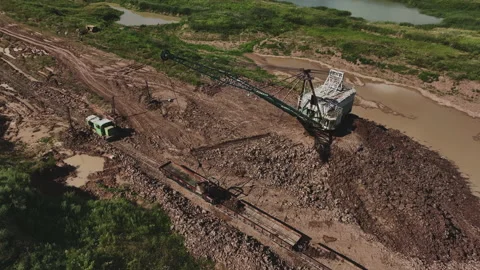 Open-pit mining. Dragline excavator load... | Stock Video | Pond5