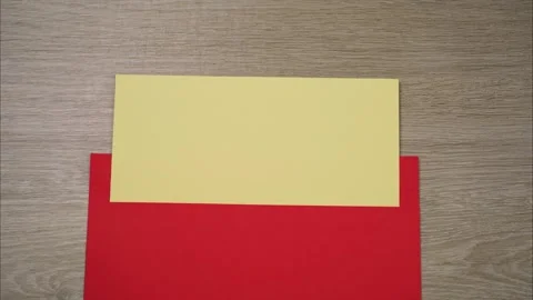 Open red envelope with blank sheet of pa... | Stock Video | Pond5