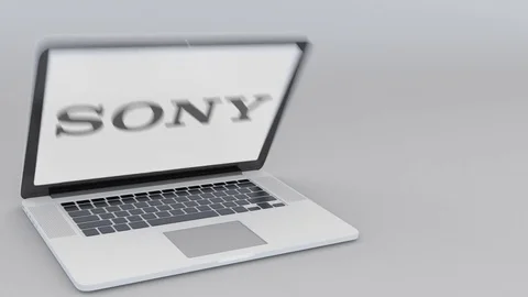 Opening and closing laptop with Sony Cor... | Stock Video | Pond5