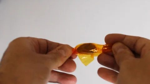 opening candy sugar wrapped tasty | Stock Video | Pond5