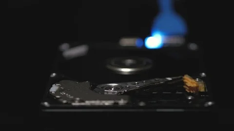 Operating hard disk drive on dark backgr... | Stock Video | Pond5