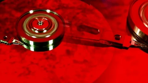 Operating hard disk drive on dark backgr... | Stock Video | Pond5