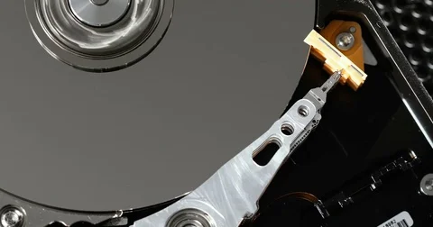 Operating hard disk drive on dark backgr... | Stock Video | Pond5