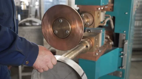 Operator is working with spot welding pr... | Stock Video | Pond5
