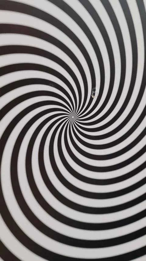 Optical illusion of a rotating spiral in... | Stock Video | Pond5
