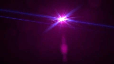 Optical Lens flare effect, purple on bla... | Stock Video | Pond5