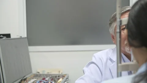 Optician at work in hospital | Stock Video | Pond5