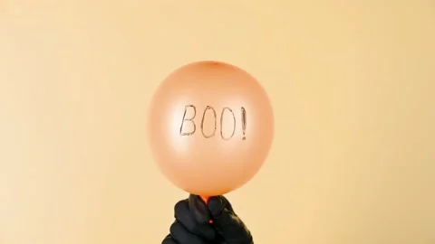 Orange balloon with the word Boo inflate... | Stock Video | Pond5