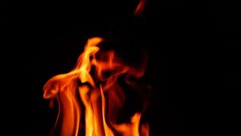 Orange flame effect from blazing fire da... | Stock Video | Pond5