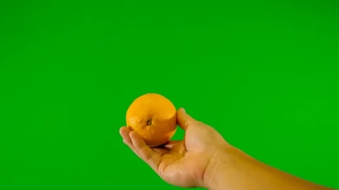 orange with green background throwing up... | Stock Video | Pond5