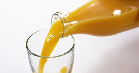 Orange Juice being poured into Glass aga... | Stock Video | Pond5