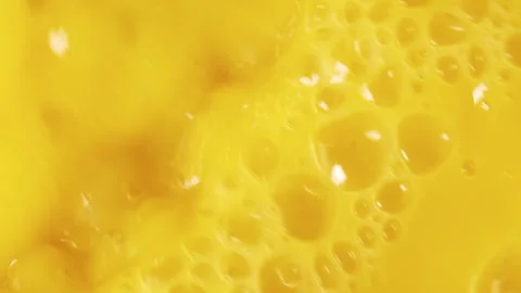 Orange juice mixing splashing, fruit jui... | Stock Video | Pond5