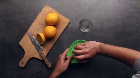 Orange juice preparation, stop motion an... | Stock Video | Pond5