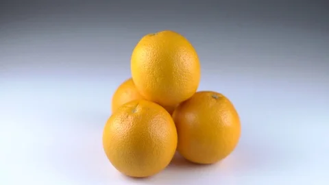 The orange pyramid taken by four people.... | Stock Video | Pond5