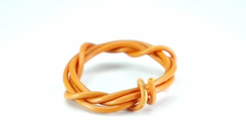 orange wire cable of usb and adapter iso... | Stock Video | Pond5