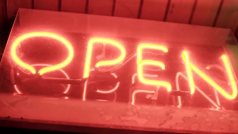 Orange, Yellow Bright Neon Open Sign at ... | Stock Video | Pond5