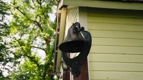 orbiting shot of a bell on the exterior ... | Stock Video | Pond5