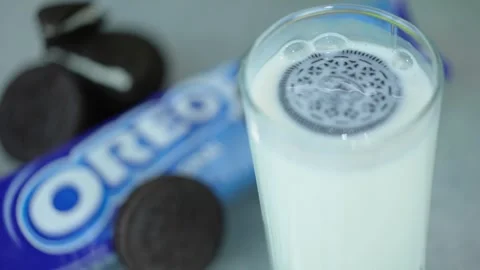 Oreo with milk. The famous blue packagin... | Stock Video | Pond5