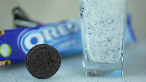 Oreo with milk. The famous blue packagin... | Stock Video | Pond5