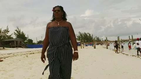 Original Bahama Mama Walking Through At ... | Stock Video | Pond5