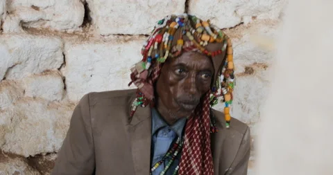 Oromo man chewing khat during Sheikh Hus... | Stock Video | Pond5