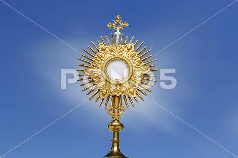 Ostensory - catholic religious symbol on blue background Stock Image ...