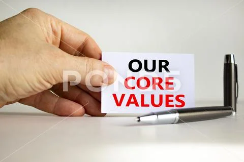 Our core values symbol. White paper with words 'Our core values' in ...