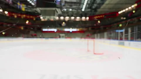 Out of focus hockey arena with in focus ... | Stock Video | Pond5