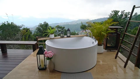 outdoor bath tub with beautiful mountain... | Stock Video | Pond5