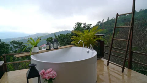 outdoor bath tub with beautiful mountain... | Stock Video | Pond5