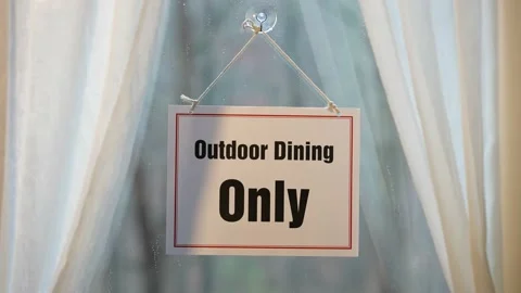 Outdoor Dining Only sign hanging in the ... | Stock Video | Pond5