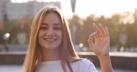 Outdoors portrait of attractive young mi... | Stock Video | Pond5