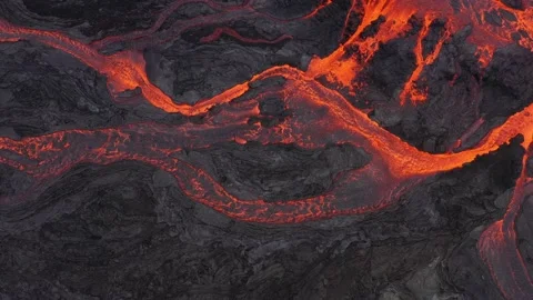 Outflowing lava flow aerial view drone v... | Stock Video | Pond5
