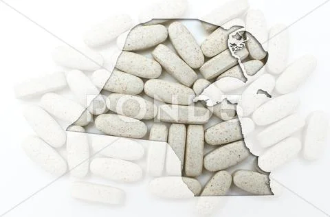 Outline map of kuwait with pills in the background for health and cure ...