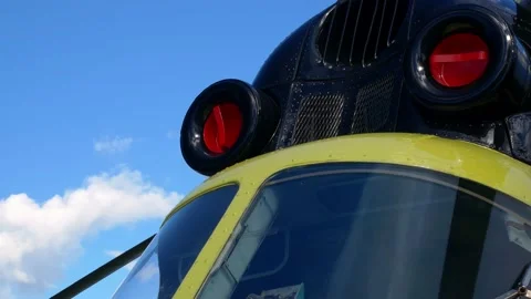An outside view of the cockpit of a yell... | Stock Video | Pond5