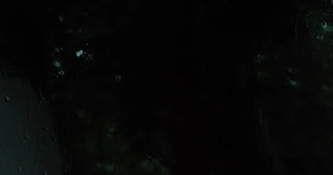 Outside the wet window of the moving car... | Stock Video | Pond5