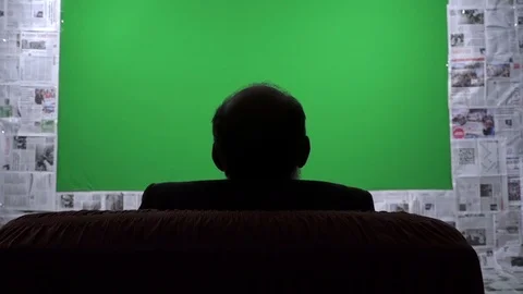 Over the shoulder shot of a man sitting,... | Stock Video | Pond5